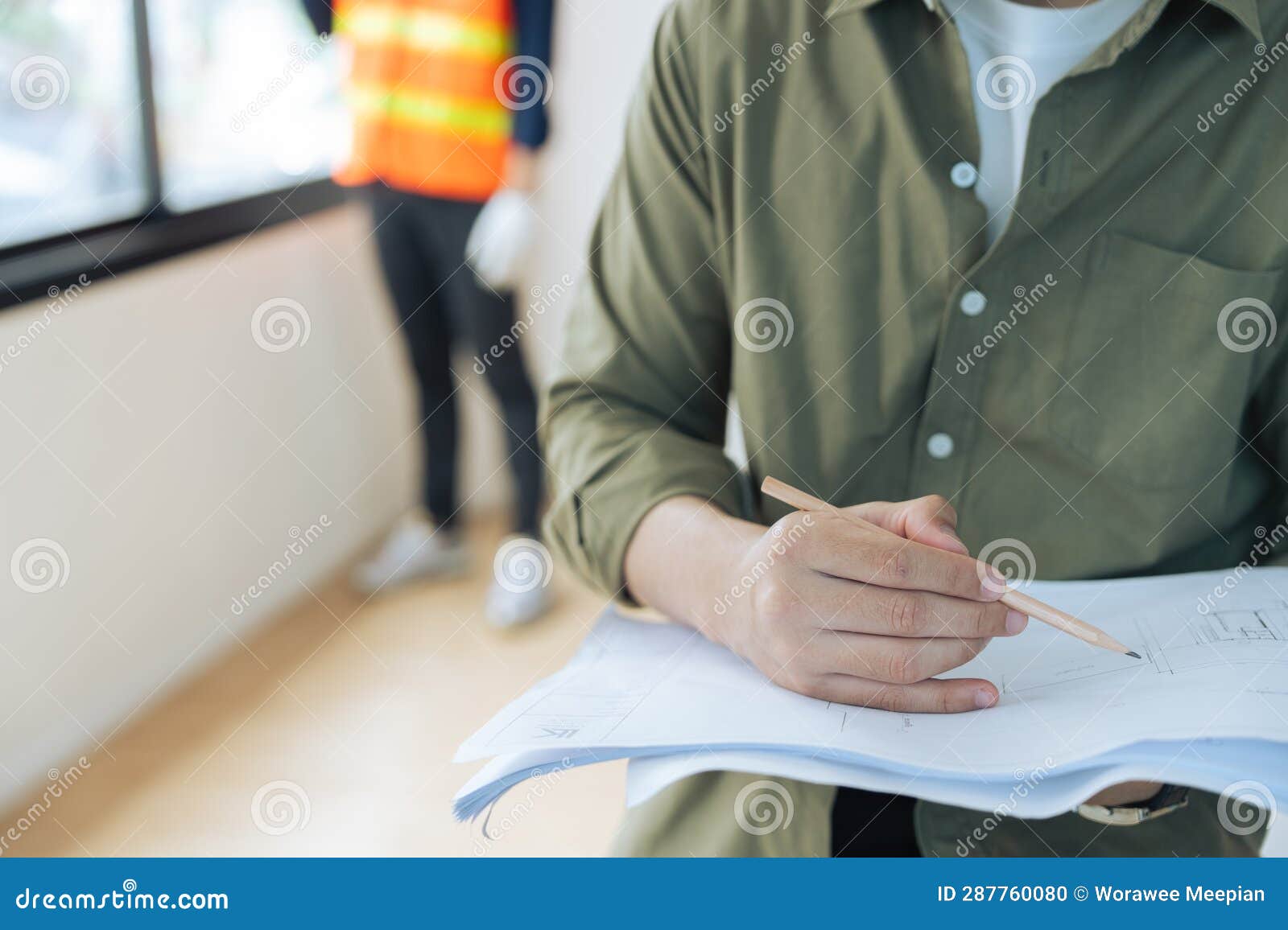 Construction Engineer with Architect Team Working Check Building ...