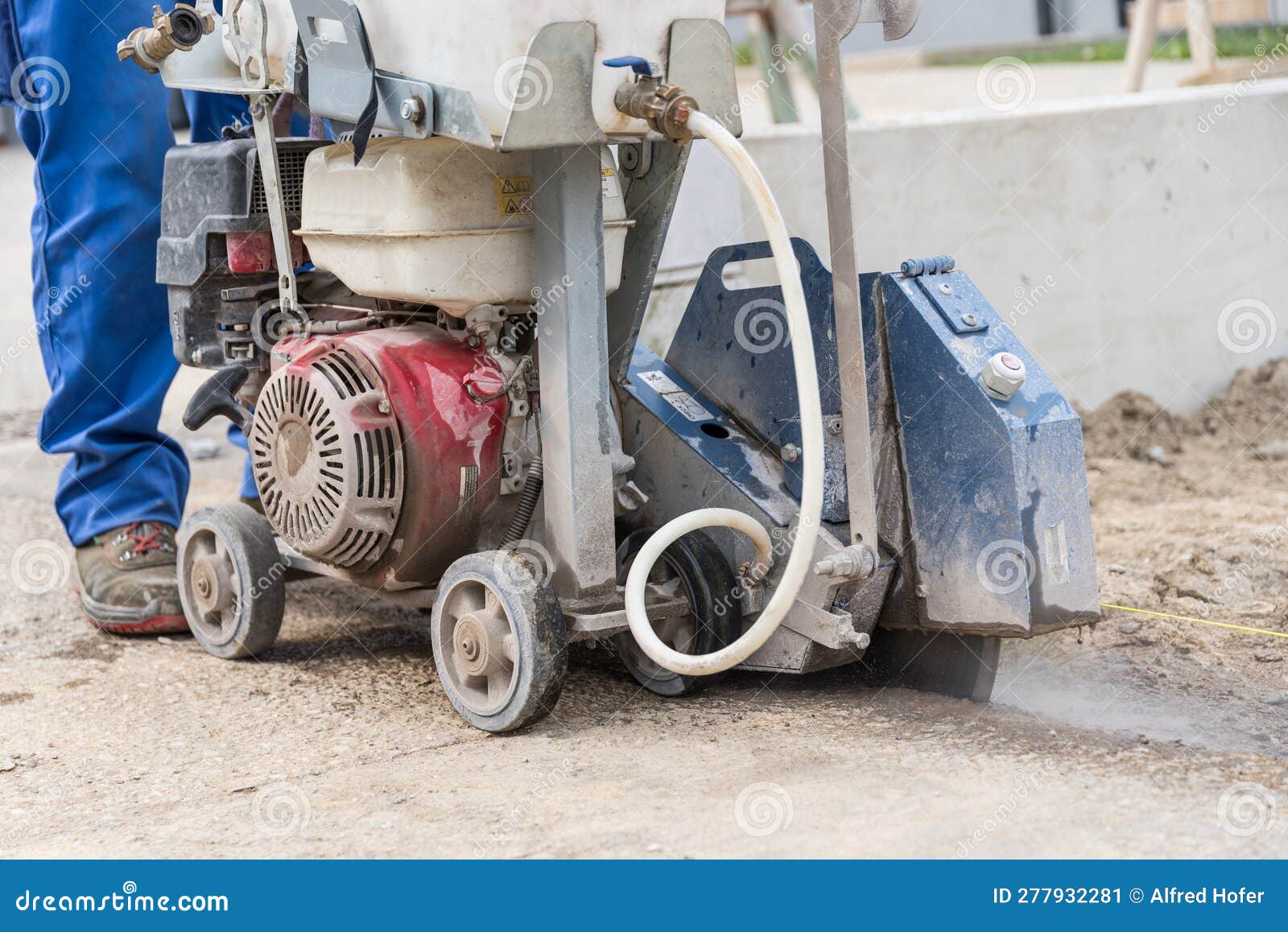 Construction Engineer with Asphalt Cutting Machine - Construction Site ...