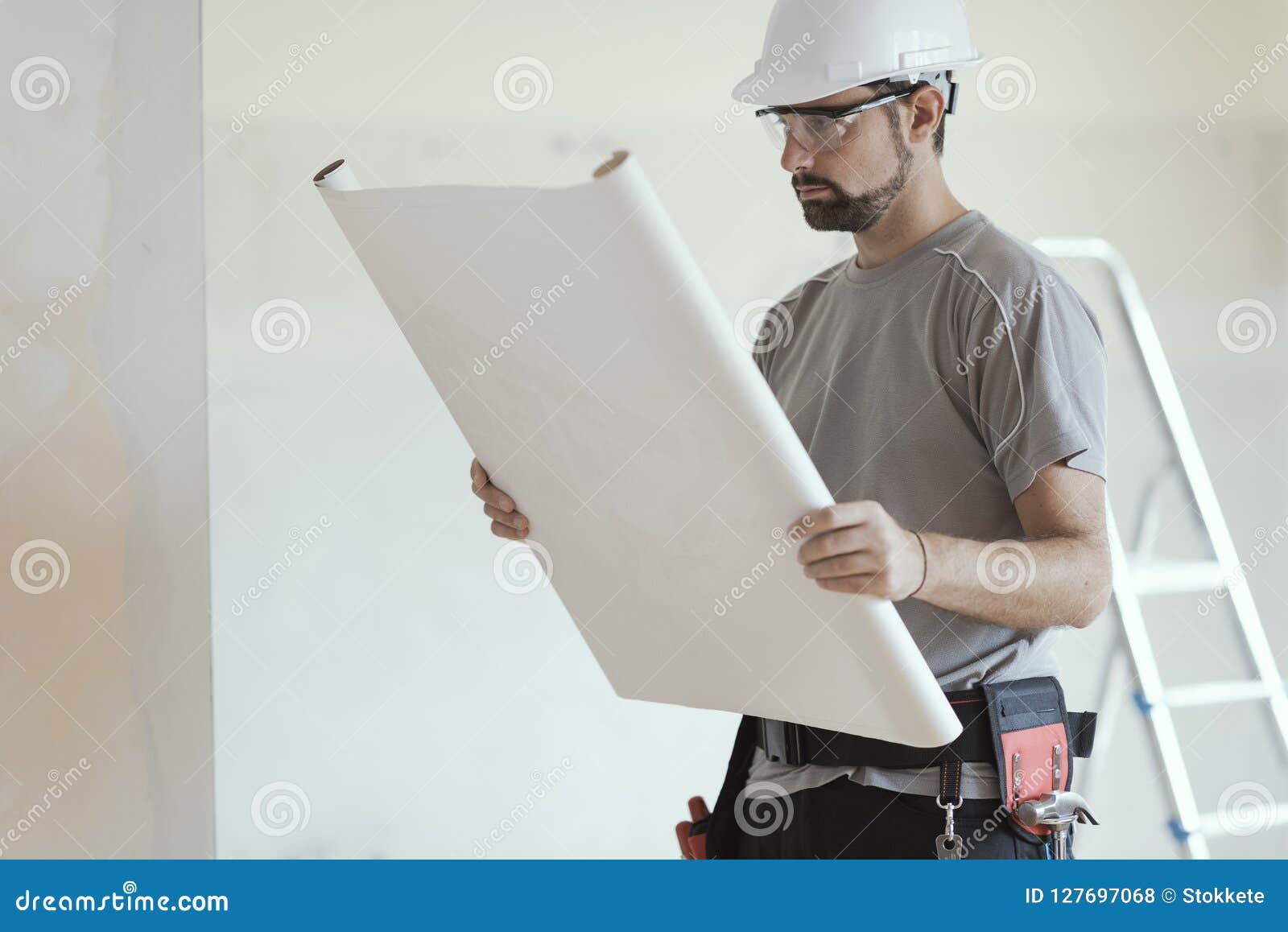Construction Engineer Checking a House Plan Stock Photo - Image of ...