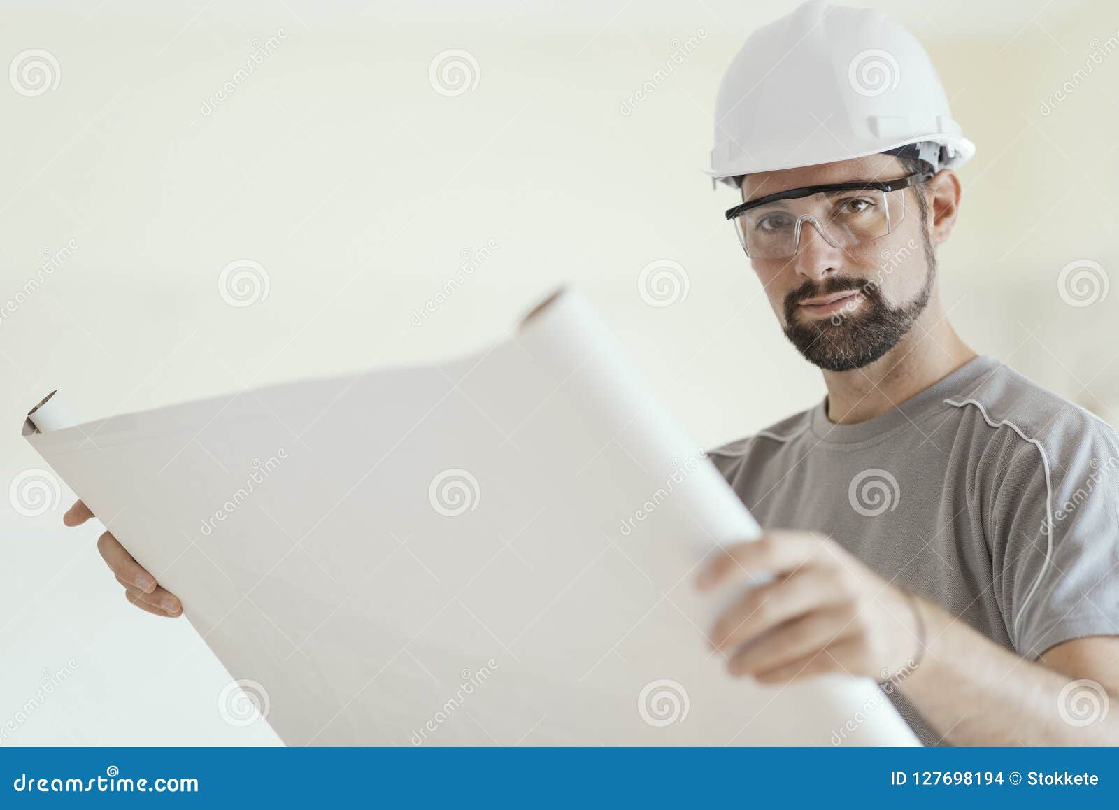 Construction Engineer Checking a House Plan Stock Photo - Image of ...