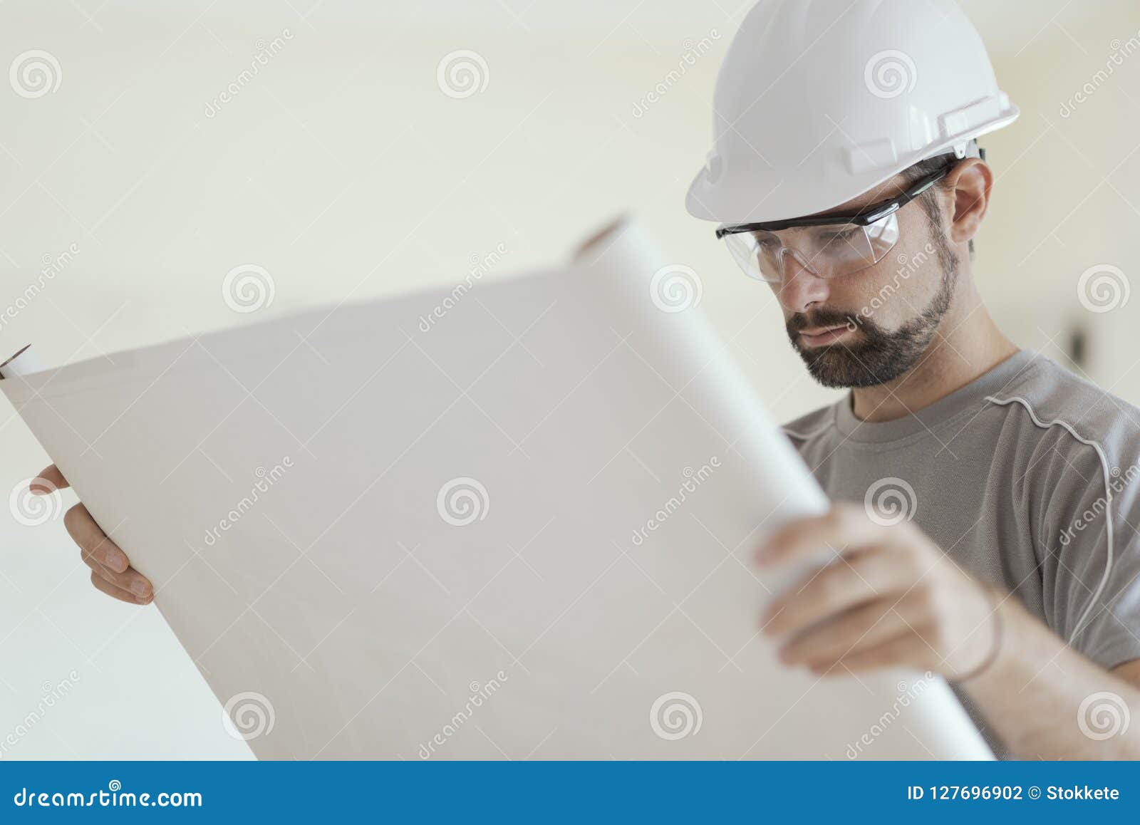 Construction Engineer Checking a House Plan Stock Photo - Image of ...