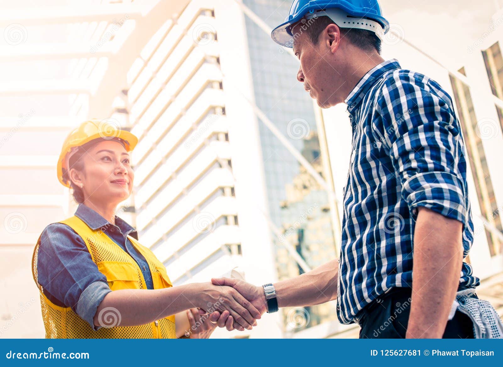 Engineer Concept The Two Engineers Holding Paper Plan, Hammer And Other ...