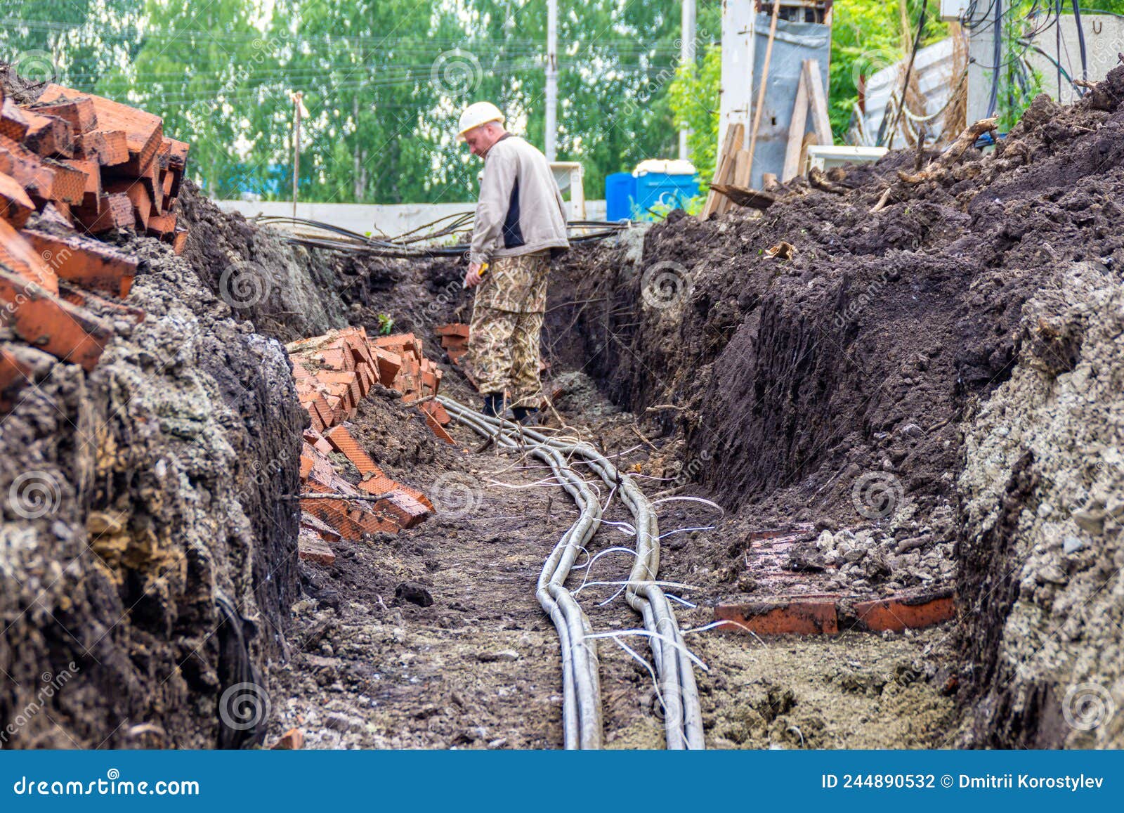 In A Trench Branching Of Cable Lines Lying In Small Gravel And ...