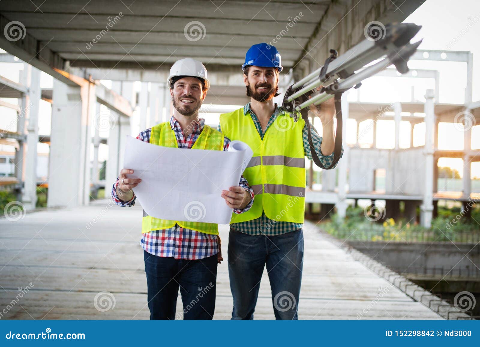 Construction Engineer with Foreman Worker Checking Construction Site ...