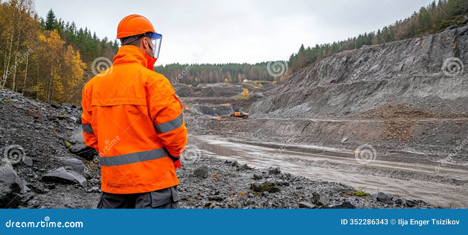 Construction Engineer in Safety Gear Supervises Operations at a Large ...
