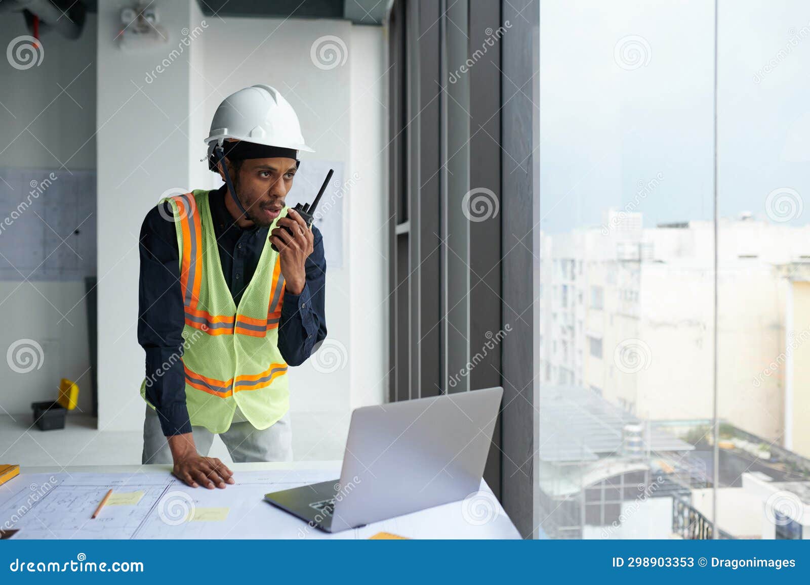 Construction Engineer Speaking in Walkie-Talkie Stock Image - Image of ...