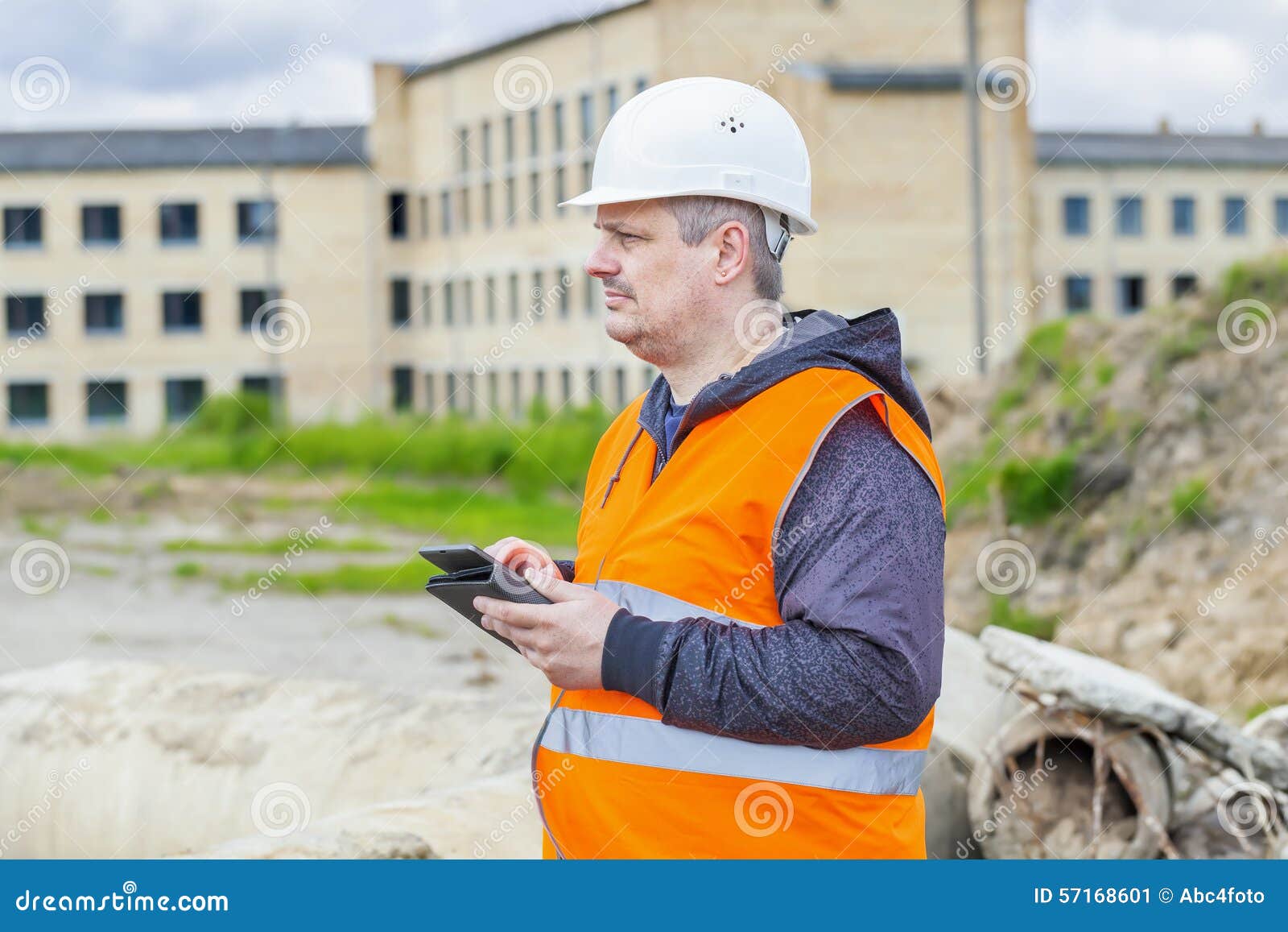 Construction Engineer with Tablet PC Near Building Stock Image - Image ...