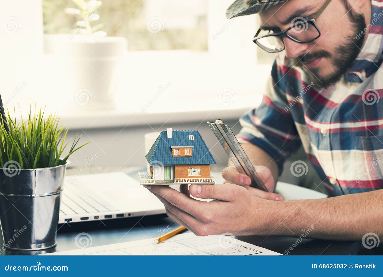 Construction Engineer Taking Measurements of New House Project Stock ...