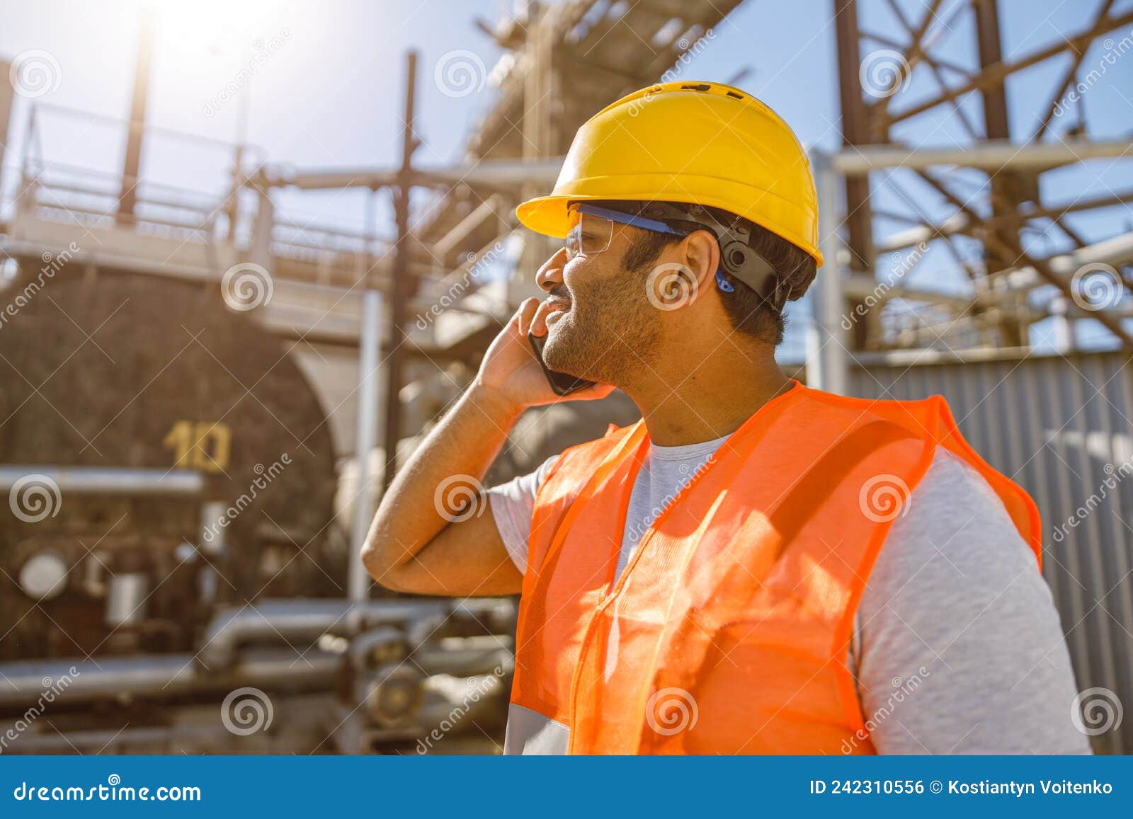 Construction Engineer with Using Cellphone at Plant Stock Photo - Image ...