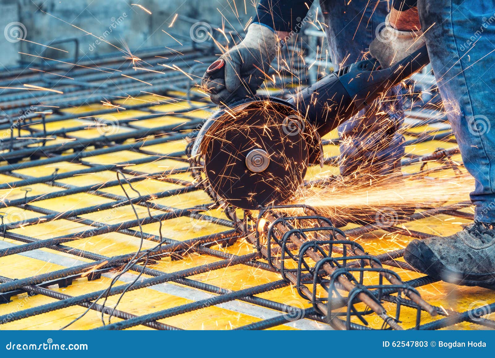 Construction Engineer Using a Saw Cutting Reinforced Steel and Bars ...