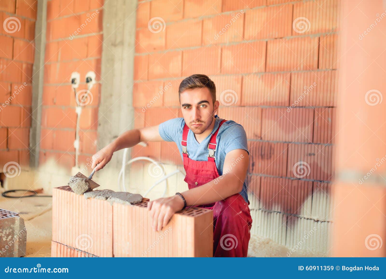 Construction Engineer and Worker Building a House, Renovating and ...