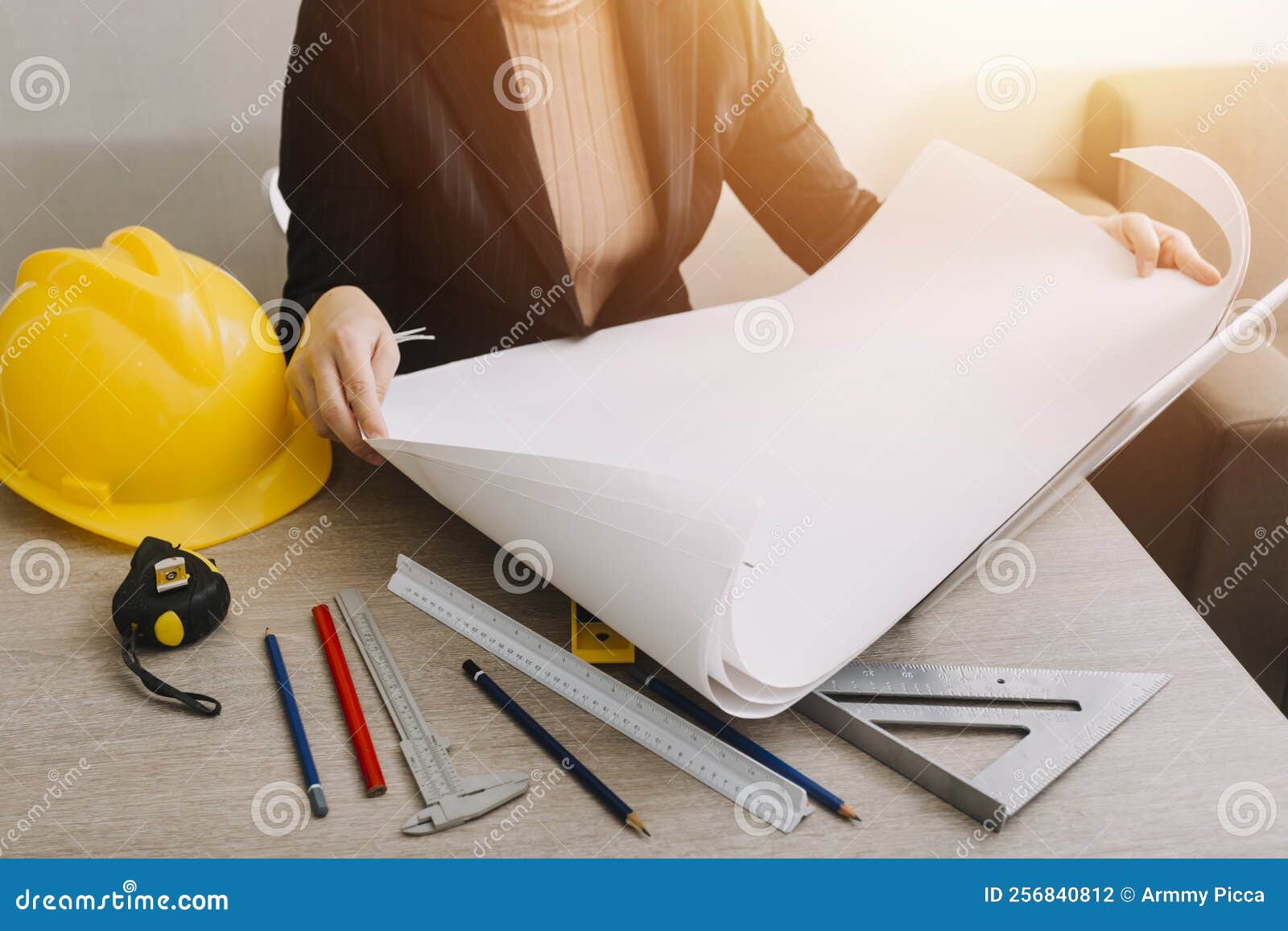 Construction Engineer Working at Blueprint To Build Large Commercial ...