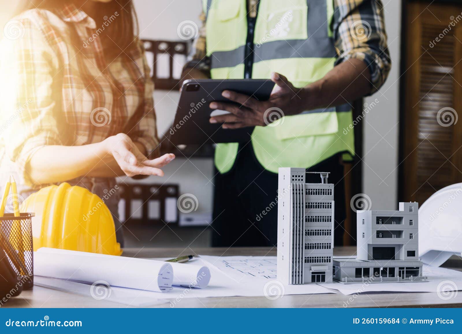 Construction Engineer Working at Blueprint To Build Large Commercial ...