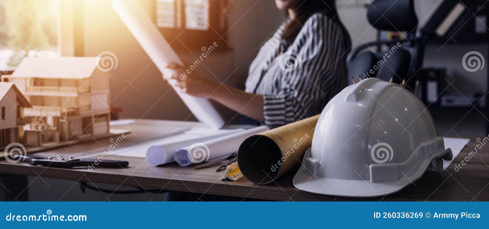 Construction Engineer Working at Blueprint To Build Large Commercial ...