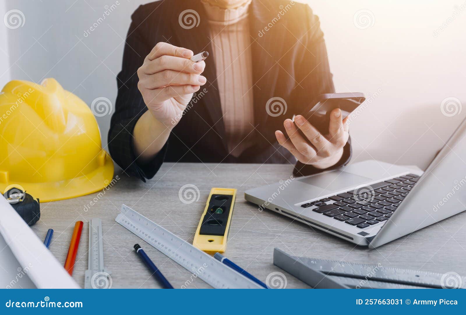 Construction Engineer Working at Blueprint To Build Large Commercial ...