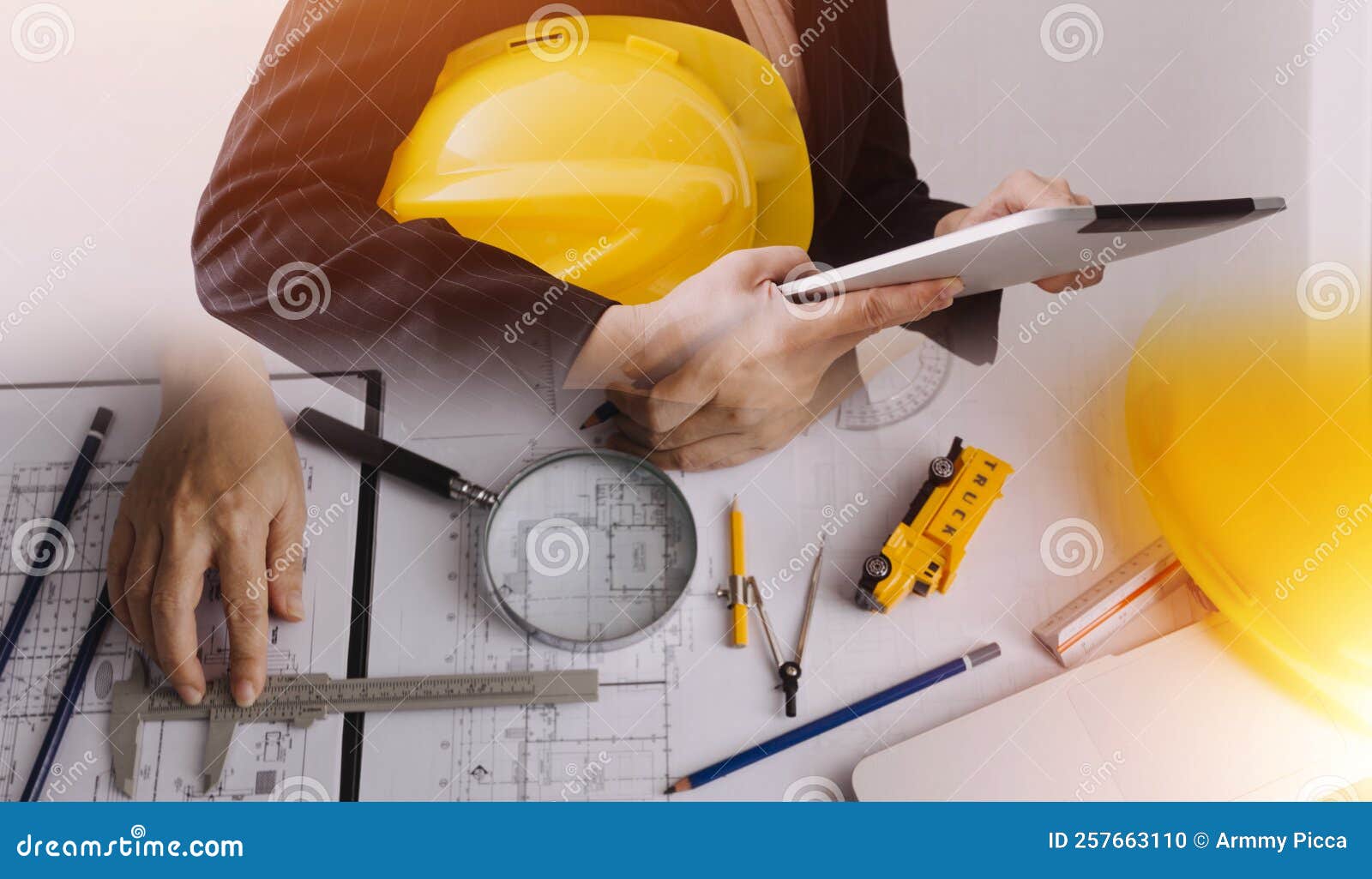 Construction Engineer Working at Blueprint To Build Large Commercial ...