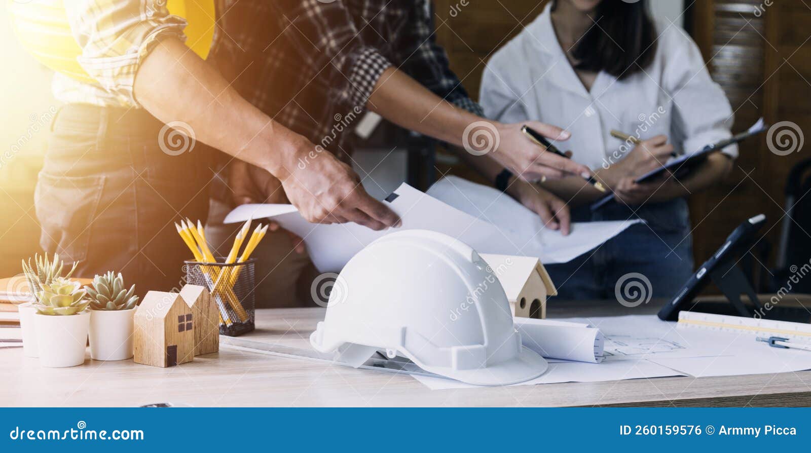 Construction Engineer Working at Blueprint To Build Large Commercial ...