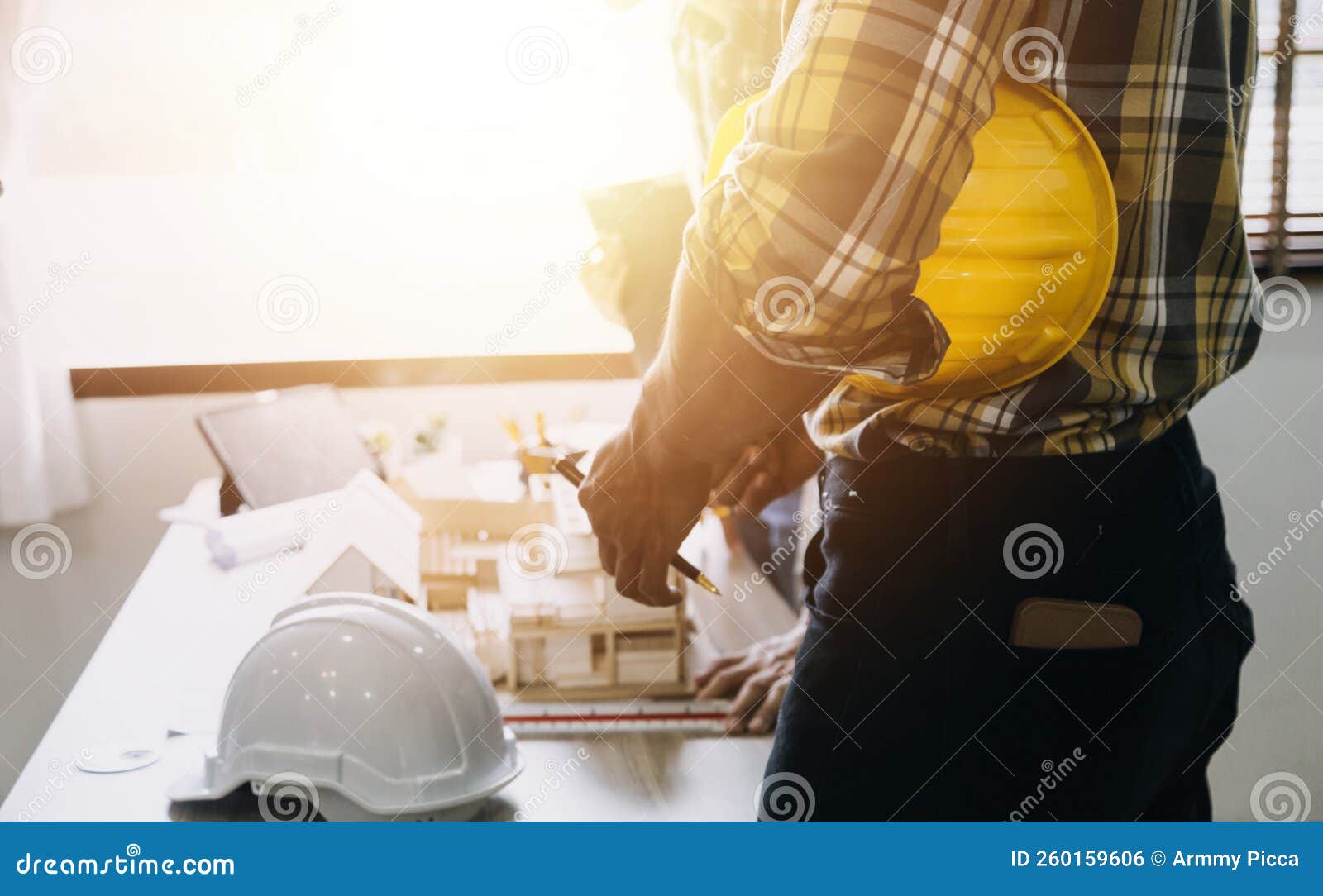 Construction Engineer Working at Blueprint To Build Large Commercial ...