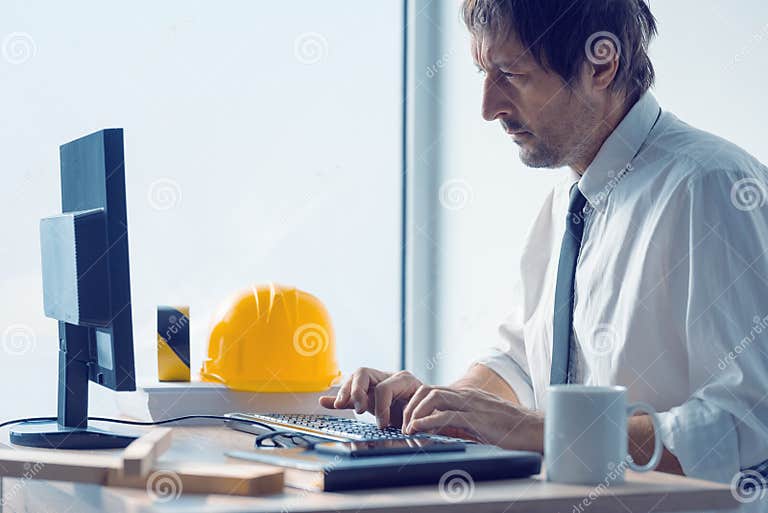 Construction Engineer Working on Desktop Computer Using CAD Soft Stock ...