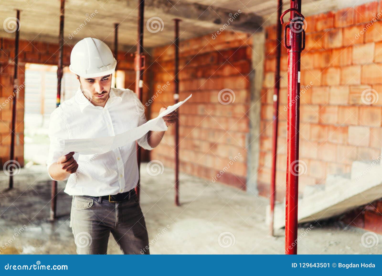 Engineer In A Paper Recycling Plant. Employees In A Paper Recycling ...