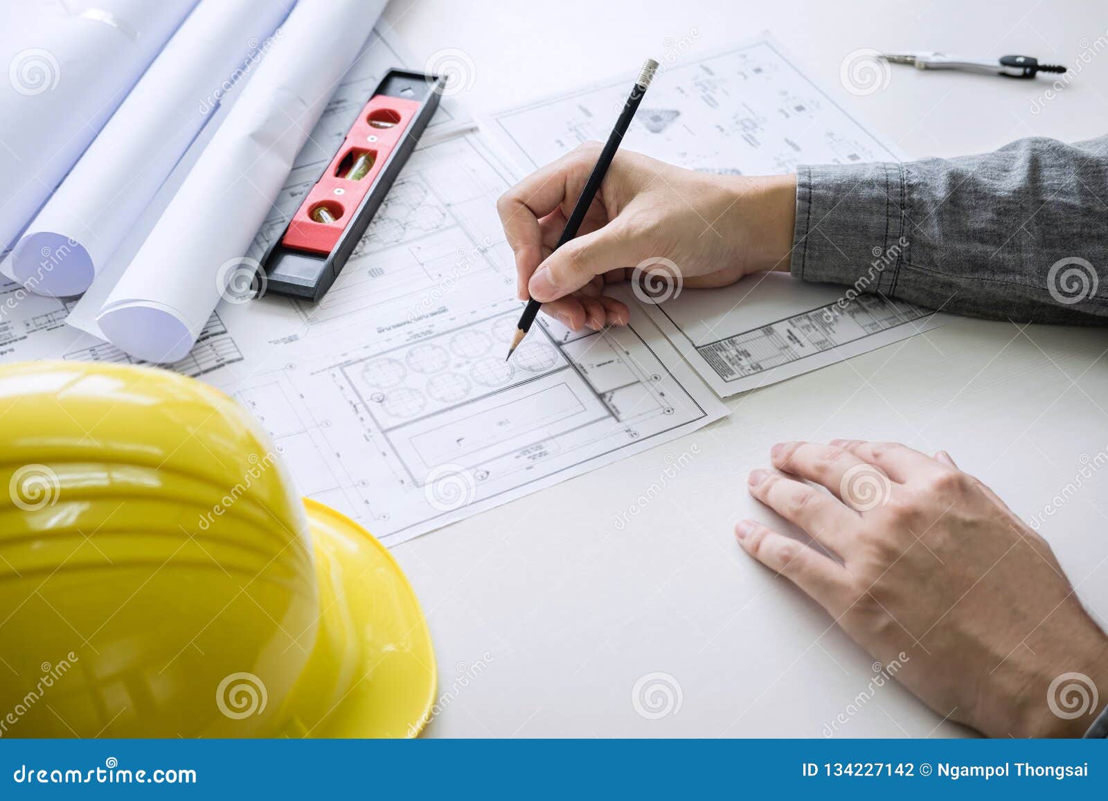 Construction Engineering or Architect Hands Working on Blueprint ...