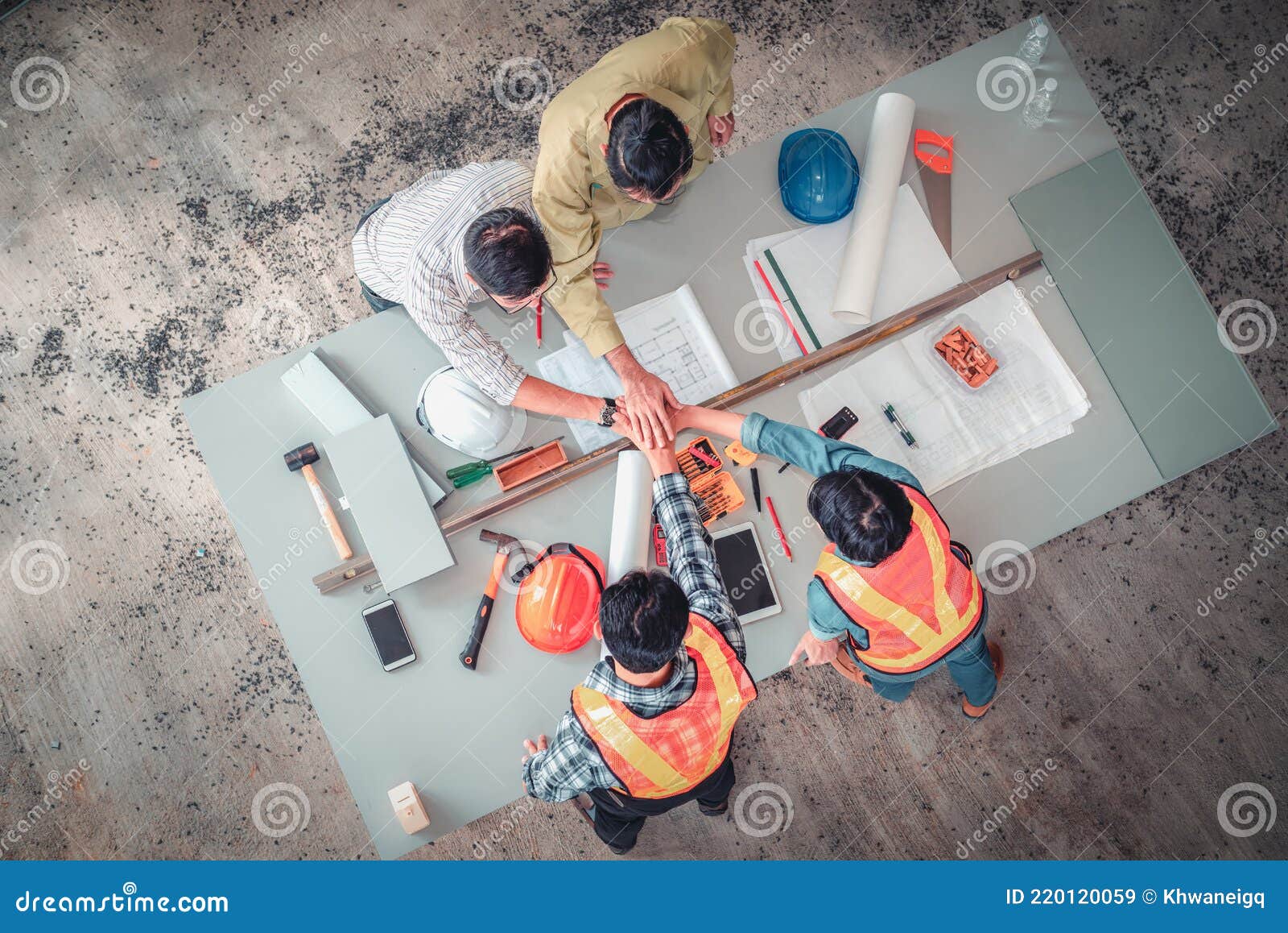 Engineering Team Having A Meeting On Construction Plan In Construction ...