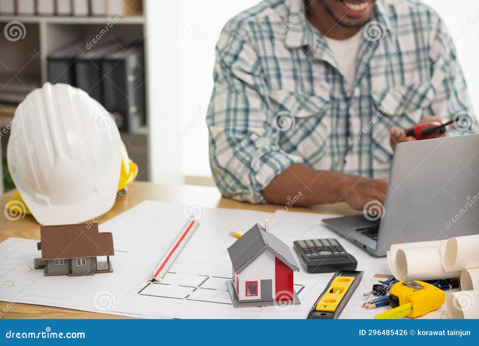 Construction Engineers are Checking Blueprints and Calculating Their ...