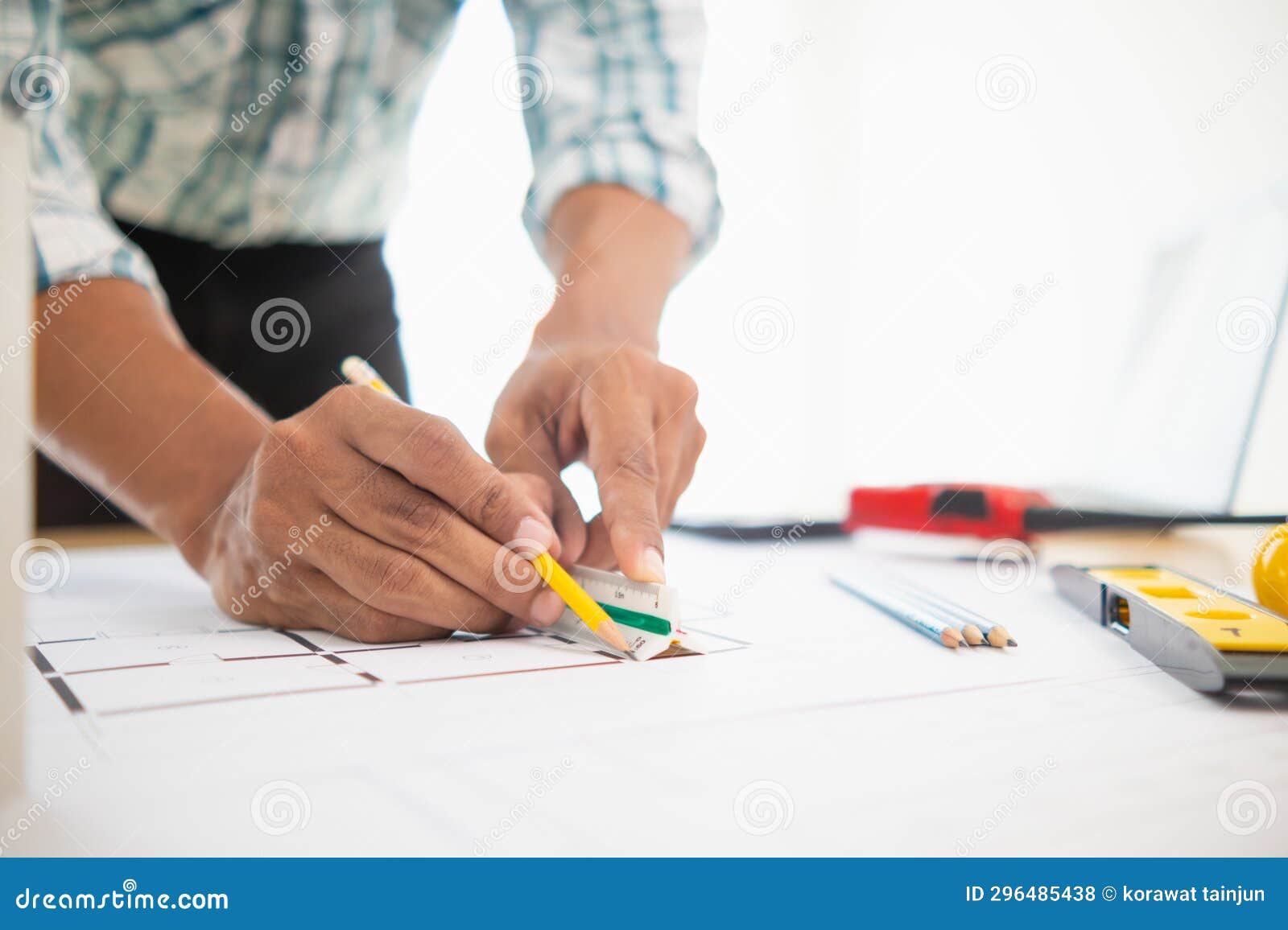 Construction Engineers are Checking Blueprints and Calculating Their ...