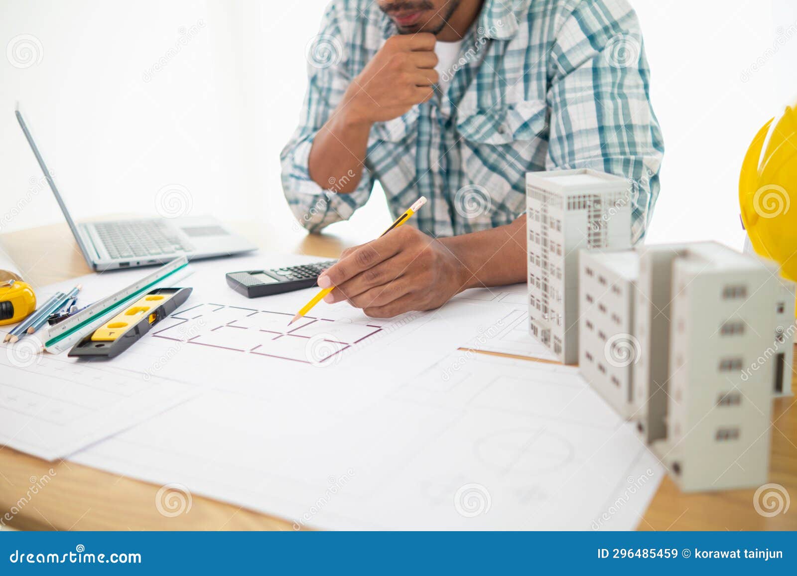 Construction Engineers are Checking Blueprints and Calculating Their ...