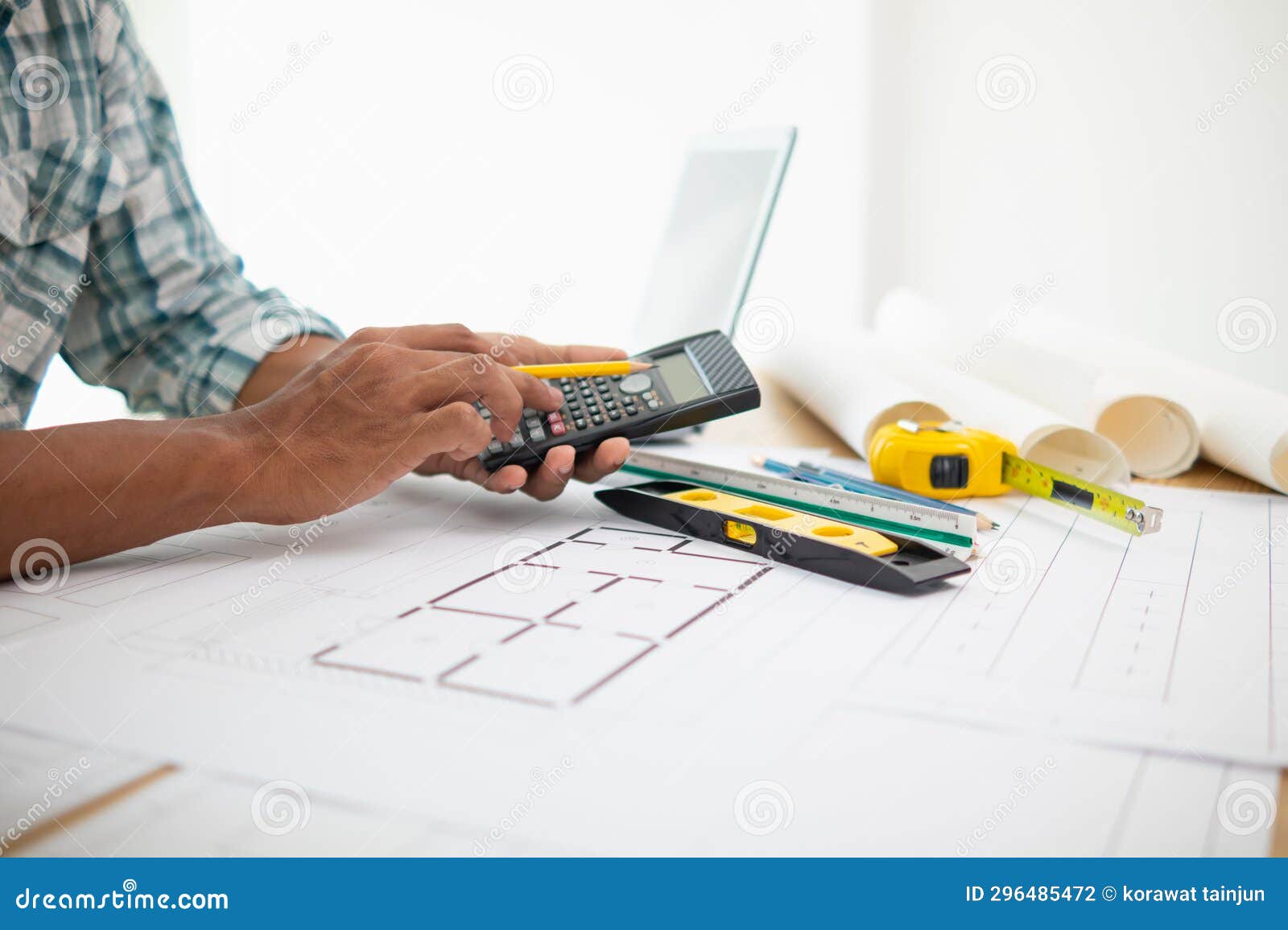 Construction Engineers are Checking Blueprints and Calculating Their ...