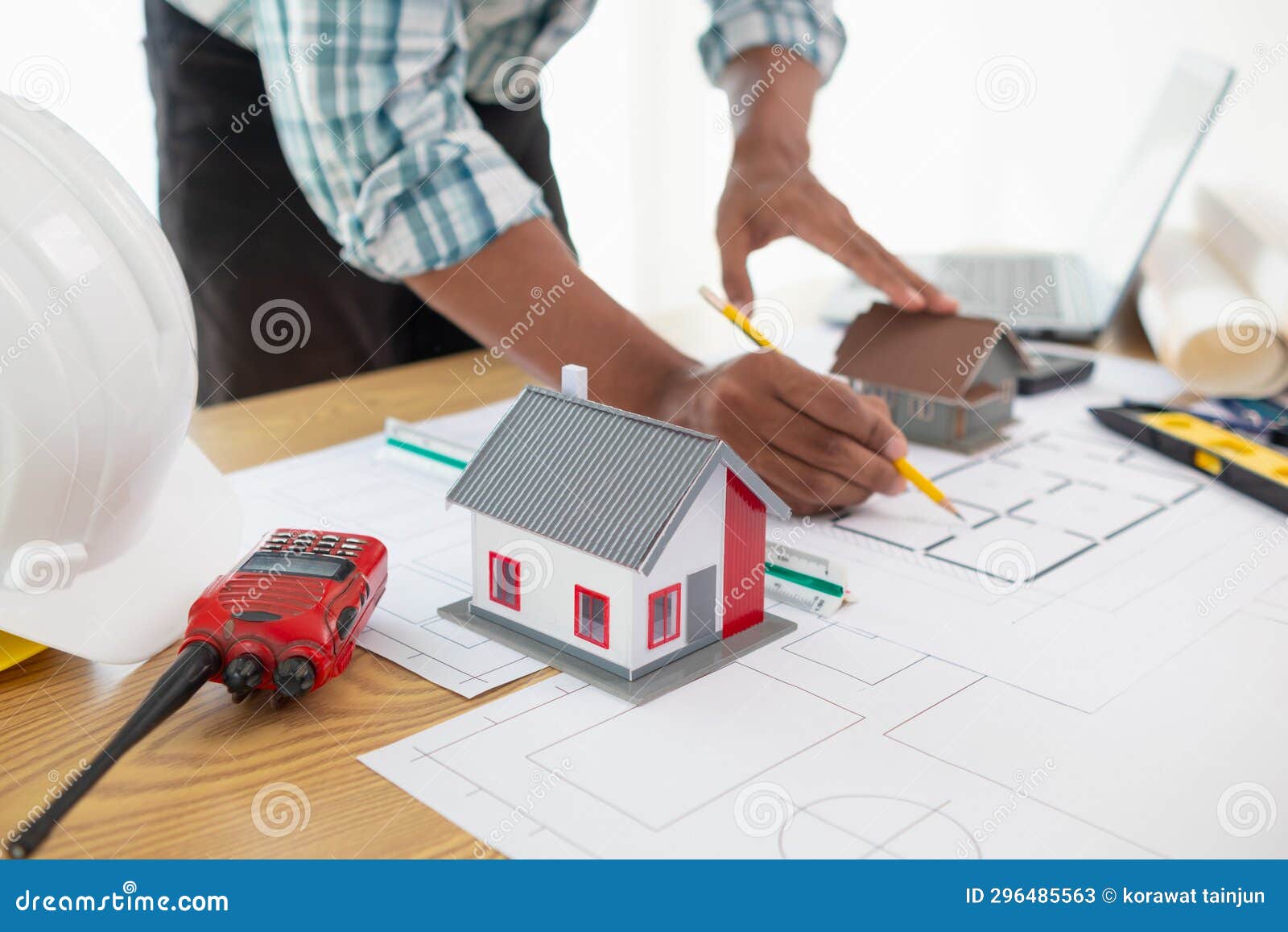 Construction Engineers are Checking Blueprints and Calculating Their ...