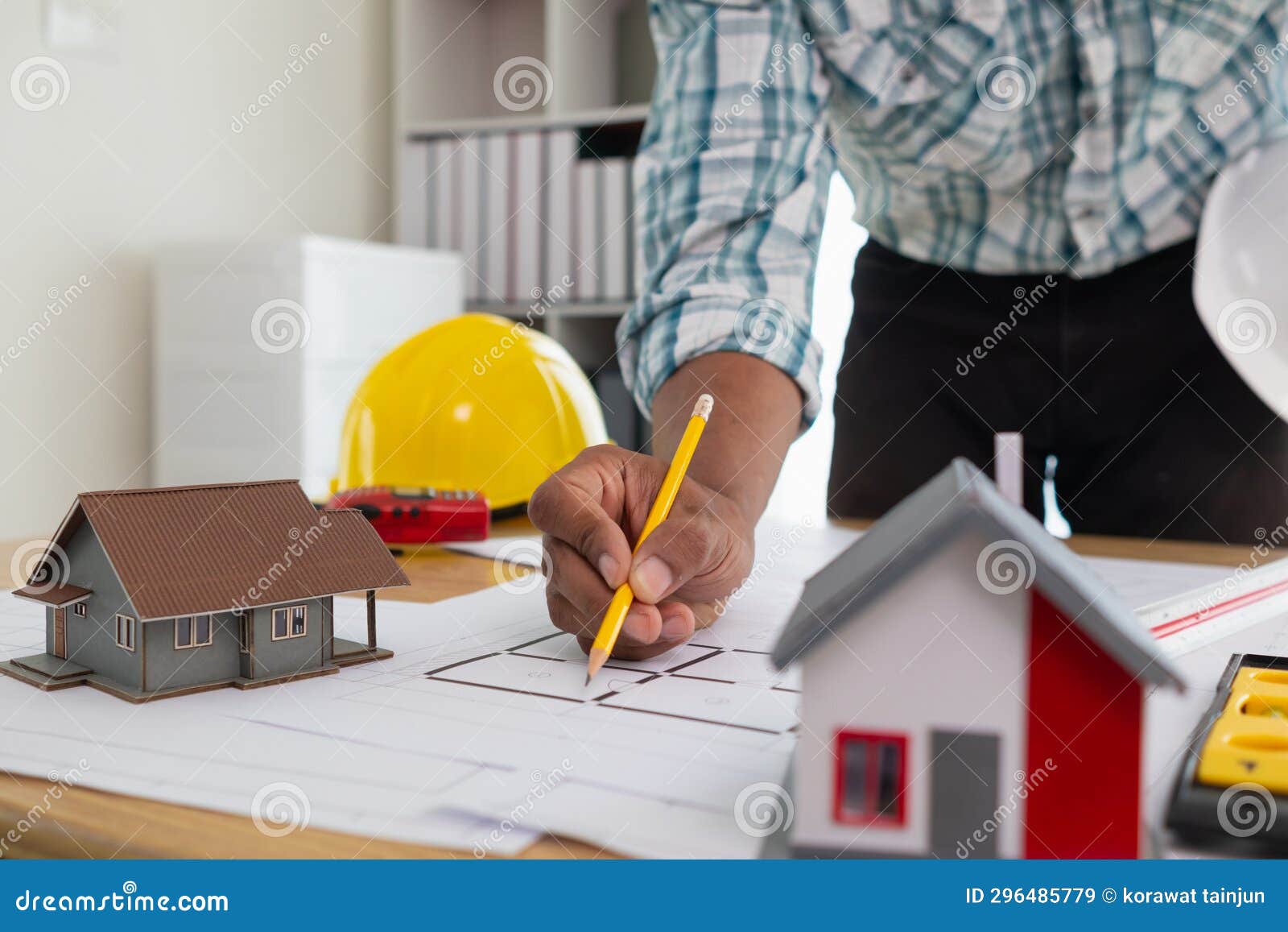 Construction Engineers are Checking Blueprints and Calculating Their ...