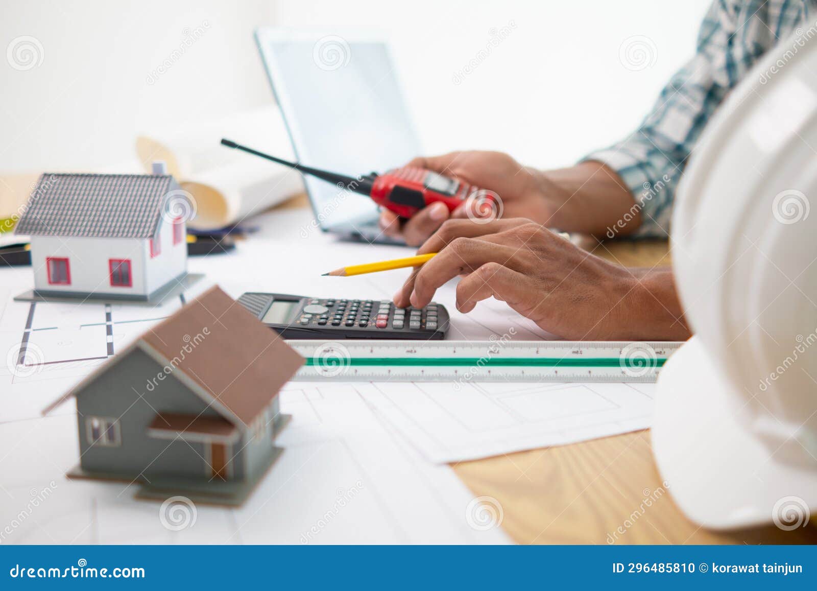 Construction Engineers are Checking Blueprints and Calculating Their ...