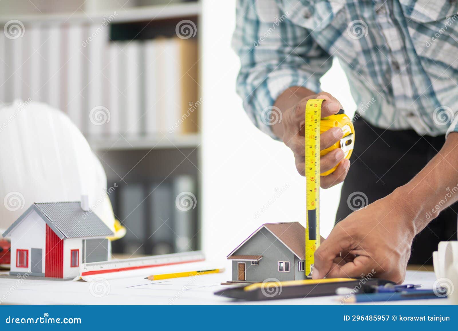 Construction Engineers are Checking Blueprints and Calculating Their ...