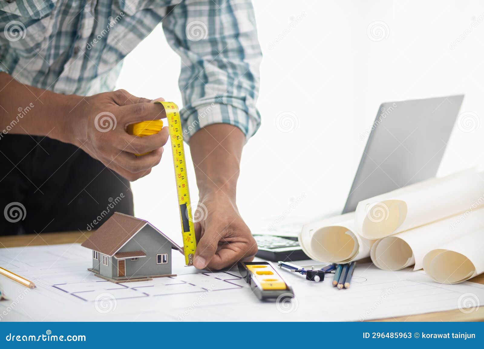 Construction Engineers are Checking Blueprints and Calculating Their ...