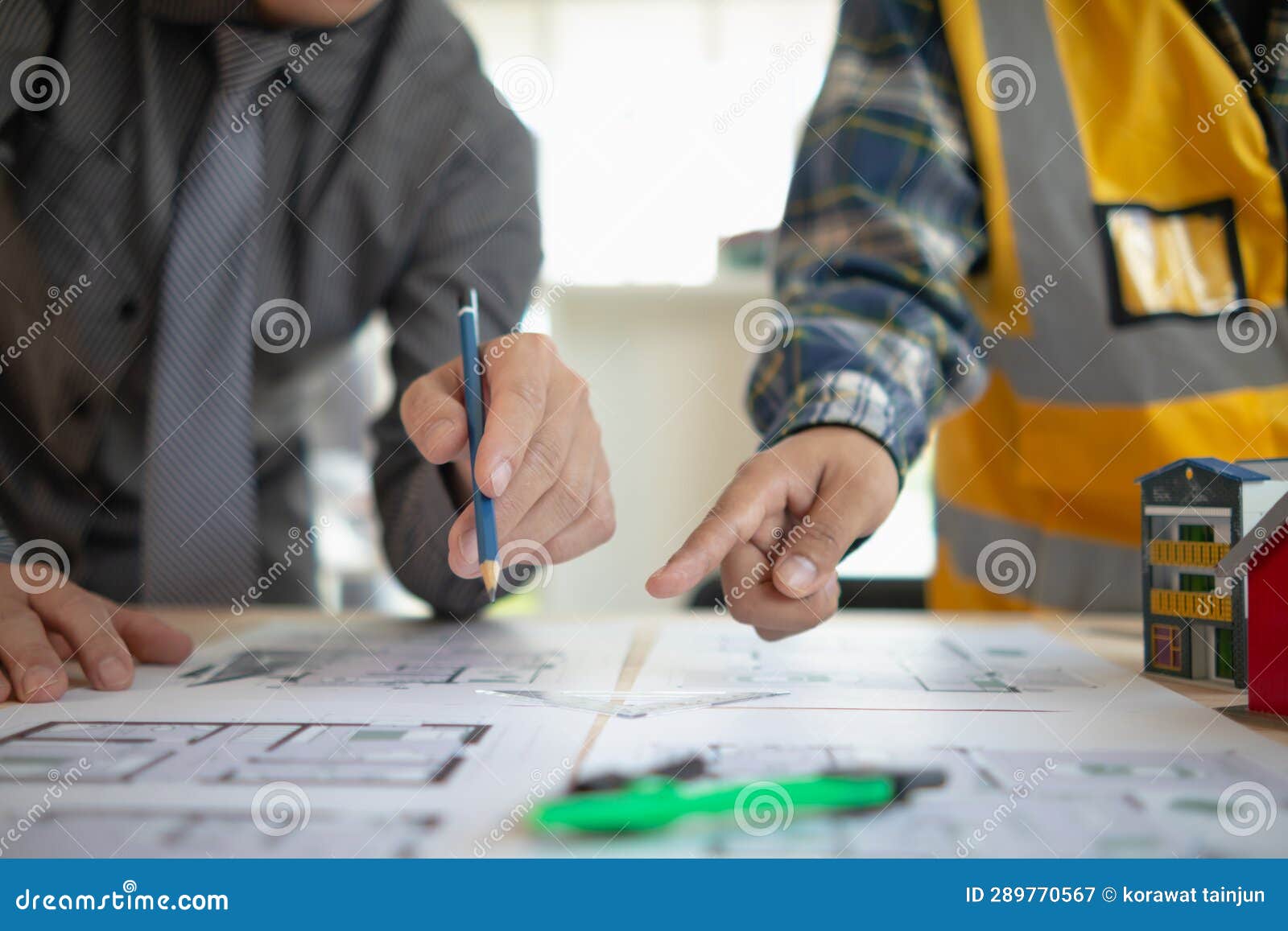 Construction Engineers Discuss and Exchange Ideas with Architects To ...