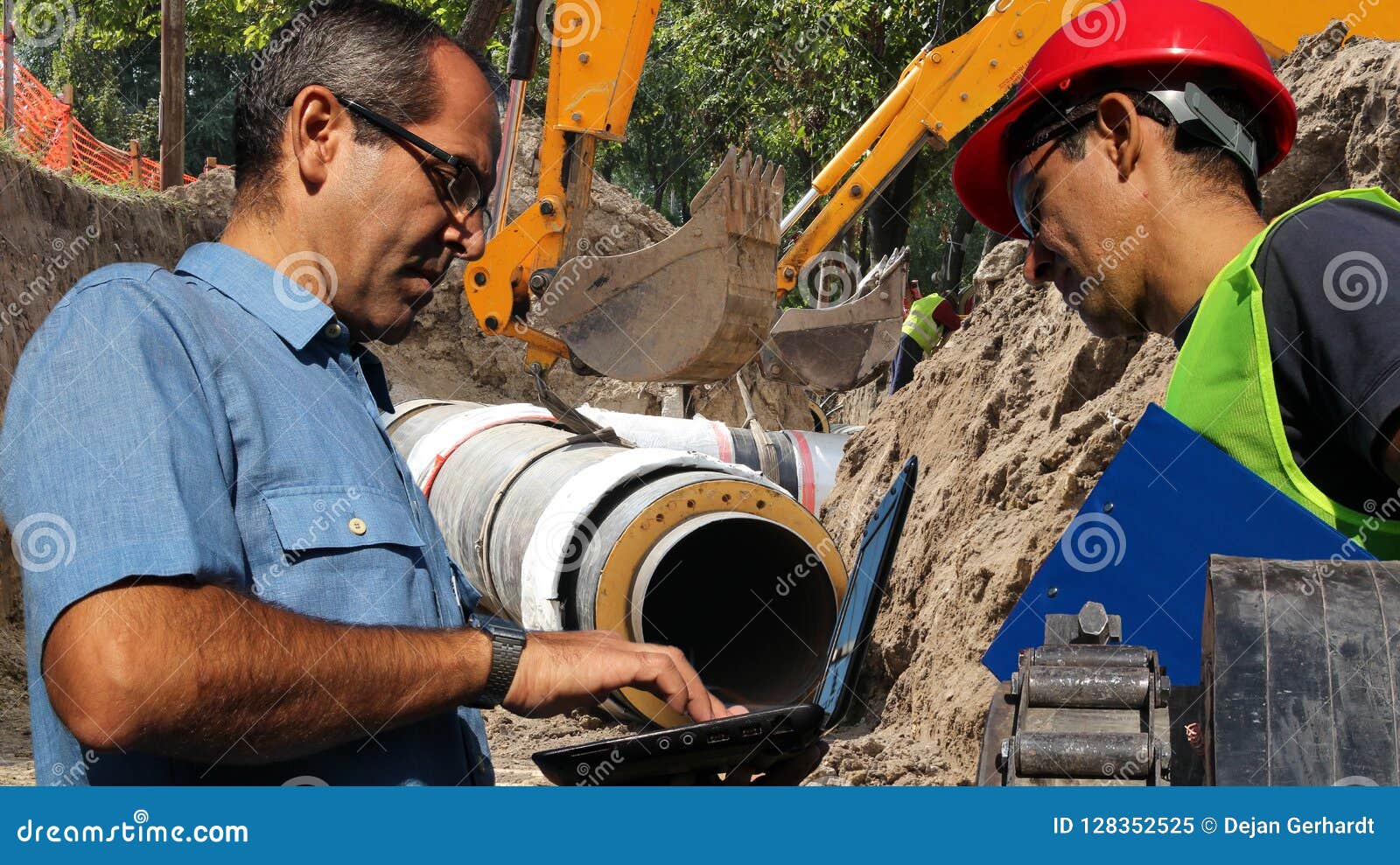 Construction Engineers Discussing Issues at Work Stock Image - Image of ...