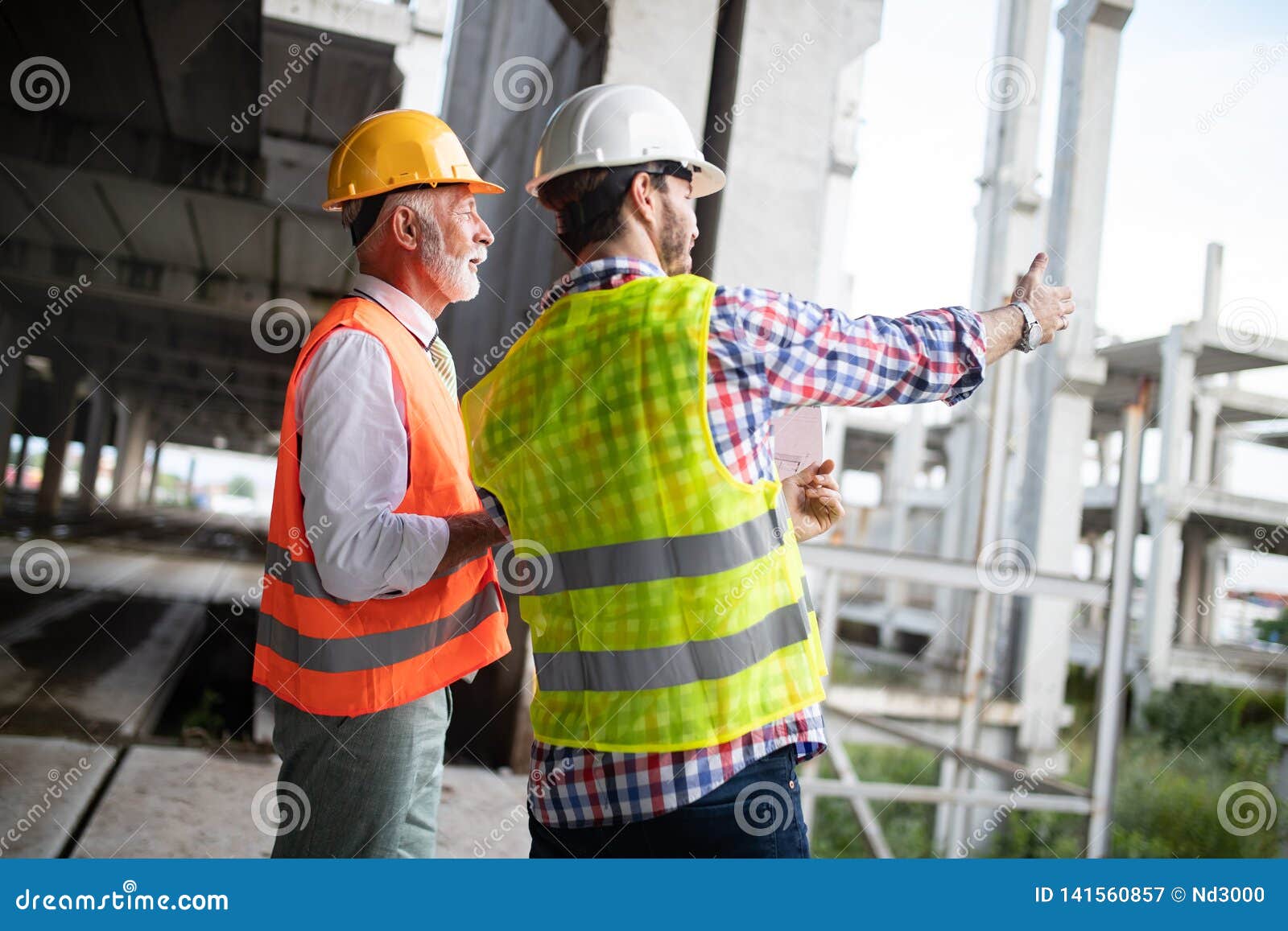 Construction Engineers Discussion with Architects at Construction or ...
