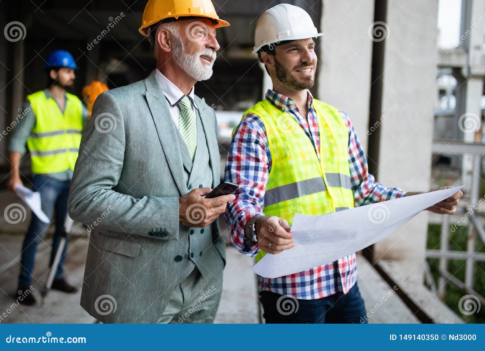Construction Engineers Discussion with Architects at Construction or ...