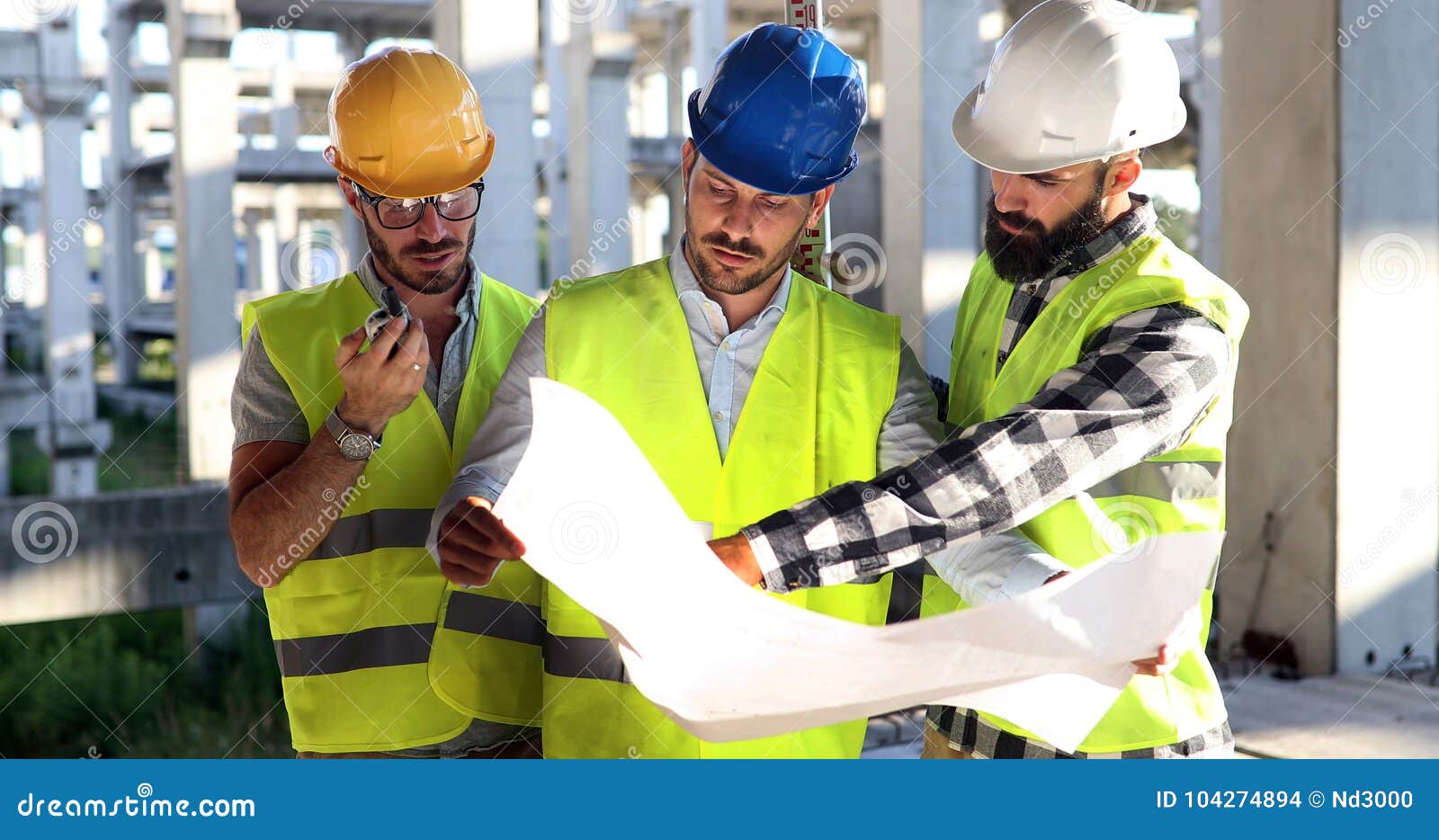 Construction Engineers Discussion with Architects at Construction Site ...