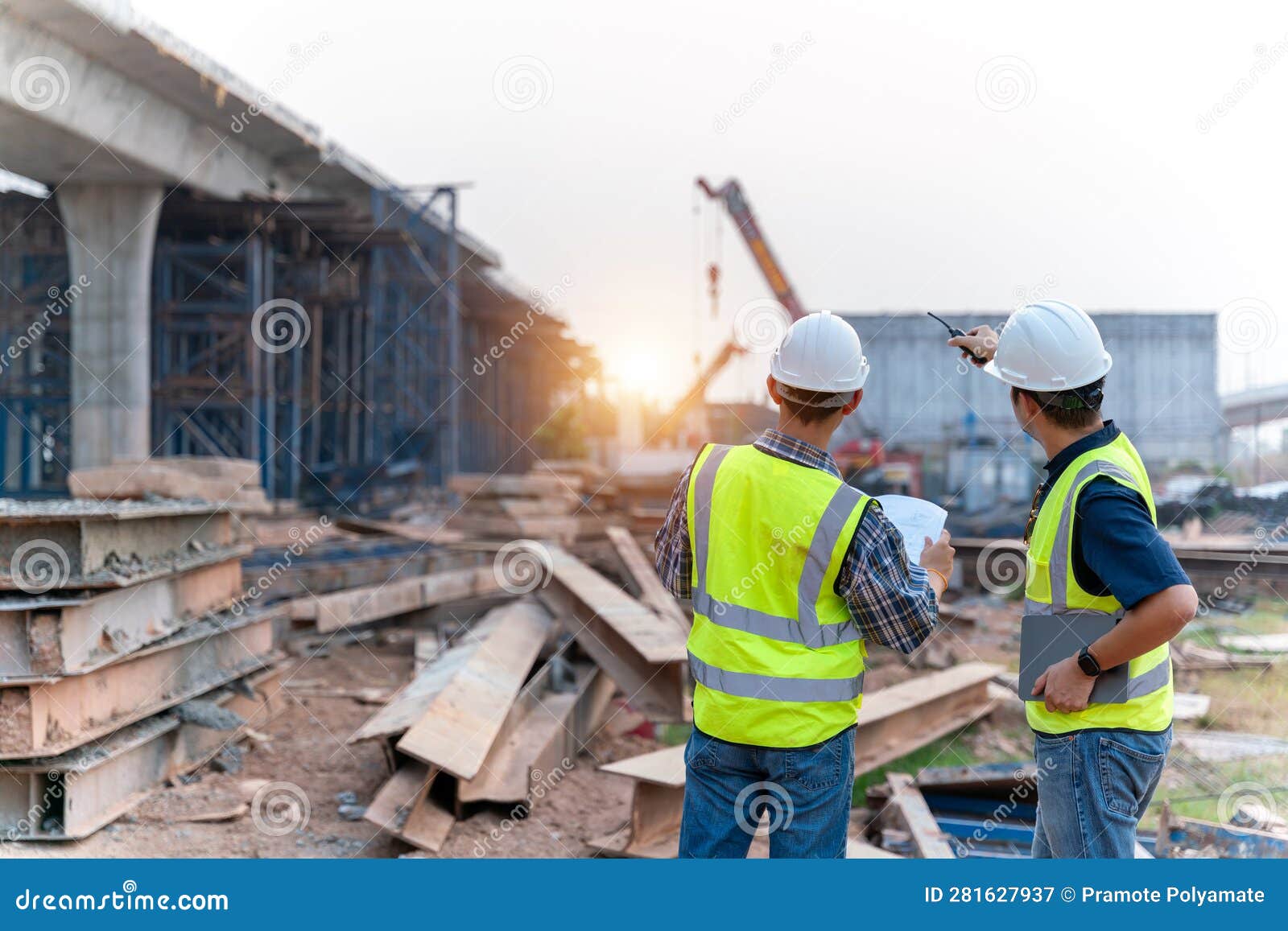 A Construction Engineers Discussion with Architects at Road ...