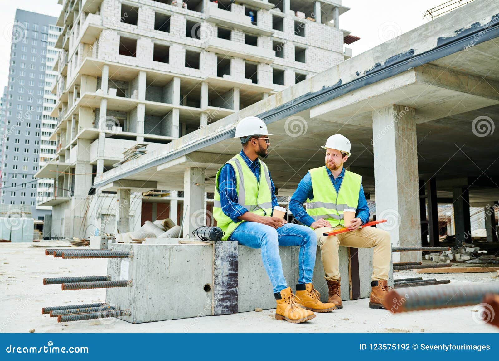 Construction Engineers Resting and Chatting Stock Photo - Image of ...