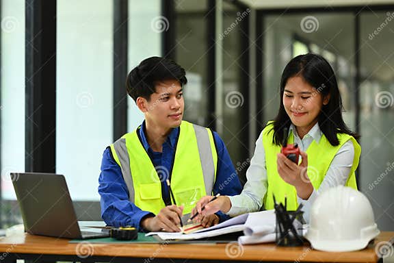 Construction Engineers Team Supervising Progress of Construction Project at Office Stock Photo ...