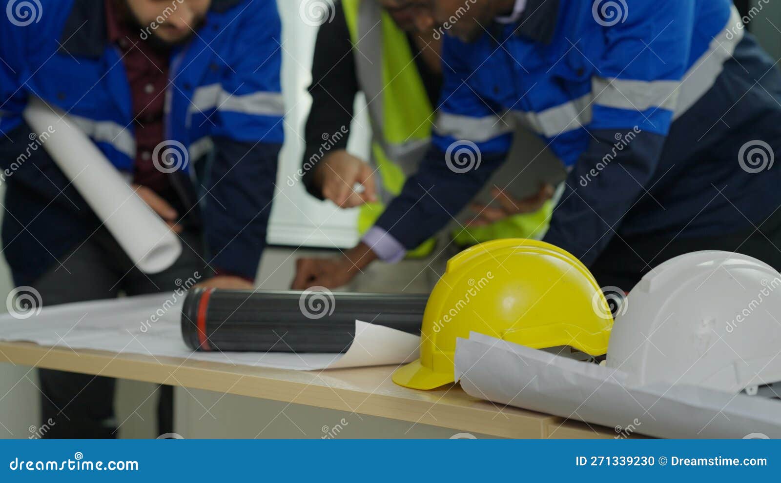 Construction Engineers Team Using Blueprint of Project Plan ...