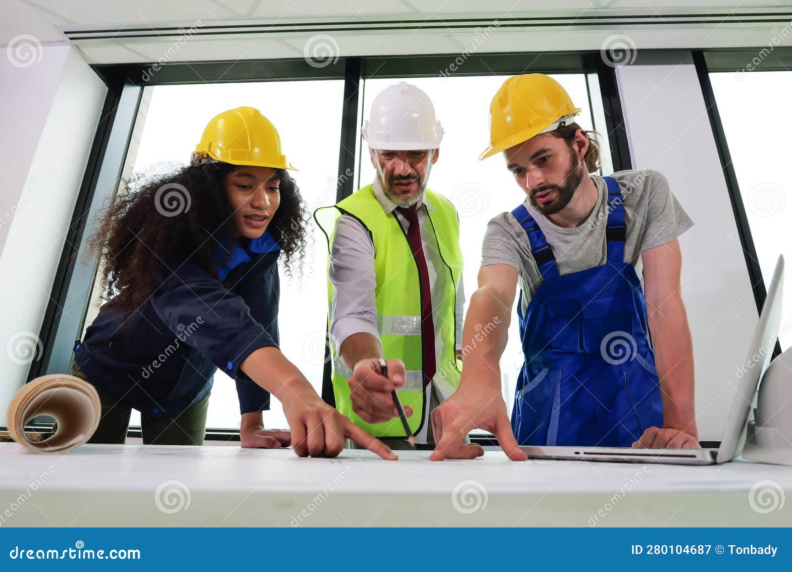 Construction Engineers Team Using Blueprint of Project Plan Stock Image ...