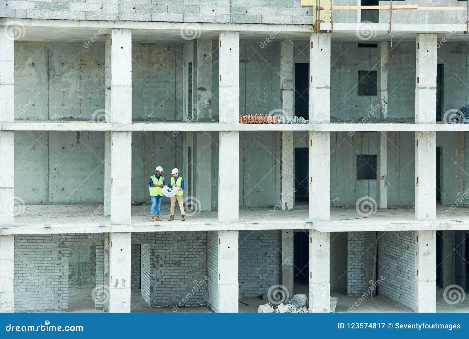 Construction Engineers in Unfinished Building Stock Image - Image of ...