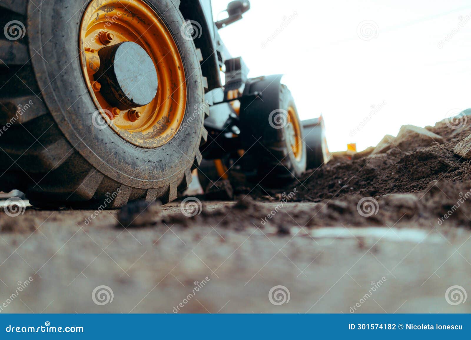 Wheels of an Excavator on a Construction Site at Work Stock Photo ...