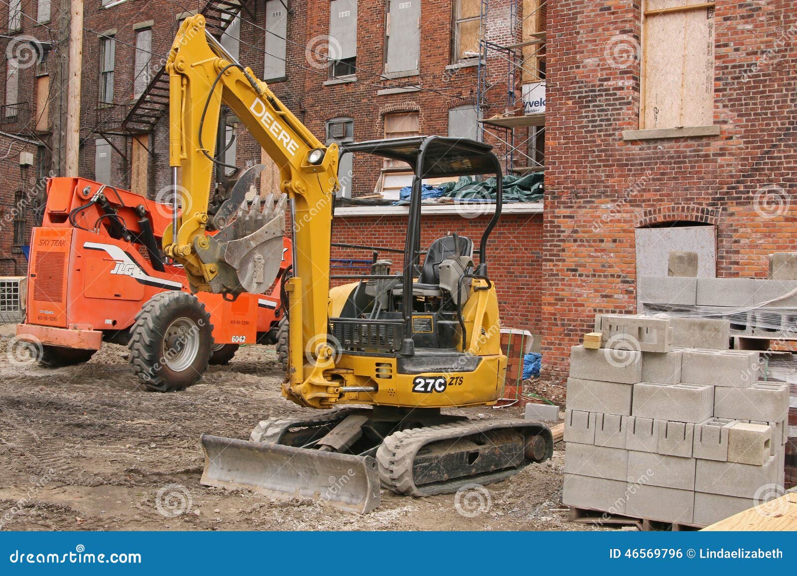 Construction Equipment, A Dump Truck, An Excavator And A Tractor Dig ...