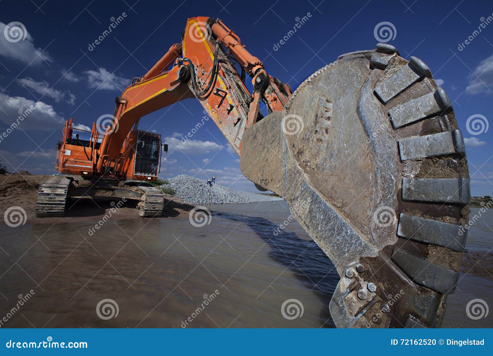 Construction Excavator Getting Ready To Scoop Earth Stock Photo - Image ...