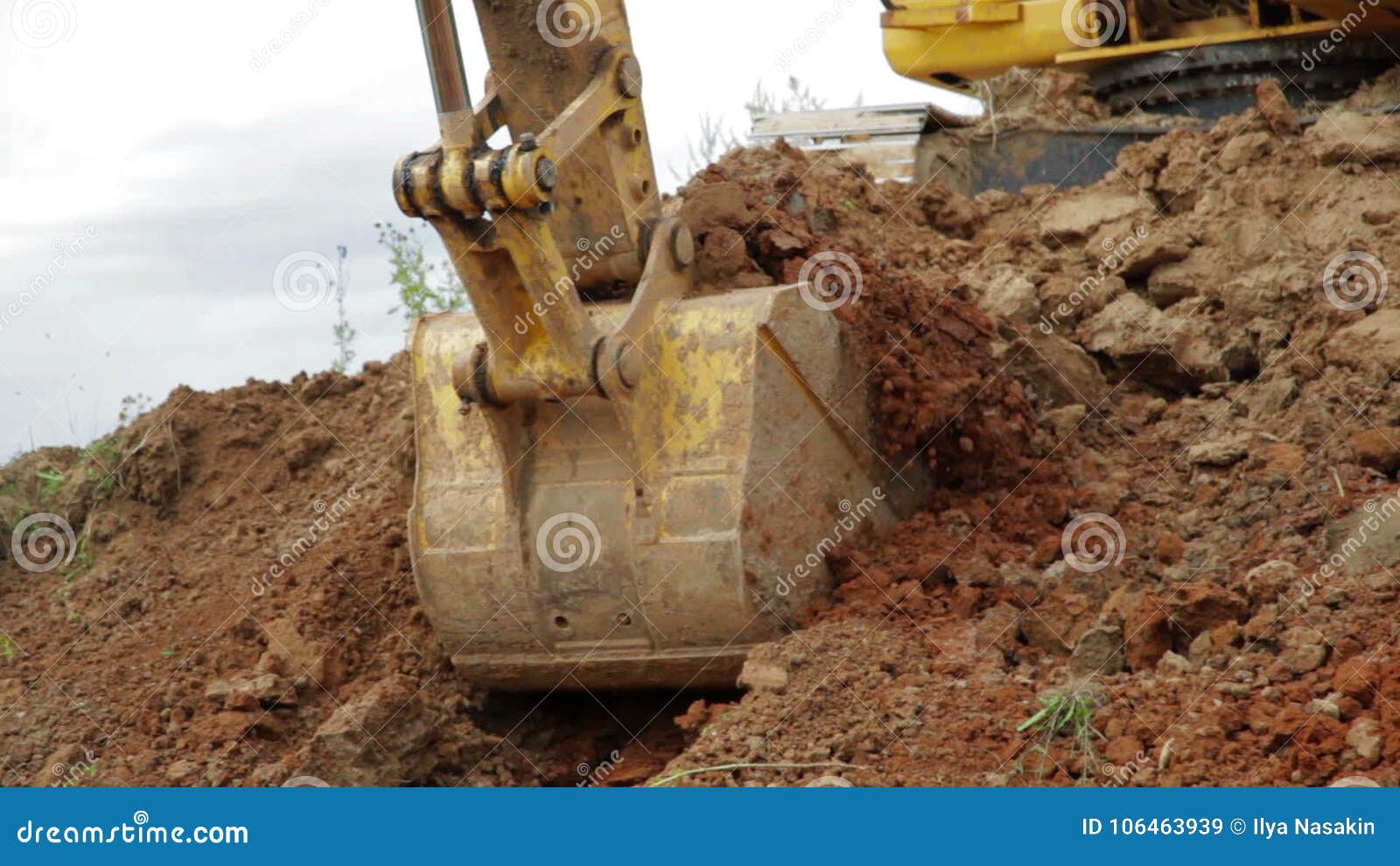 Construction Excavator Scooping and Dumping on Dirt Pile Stock Video ...